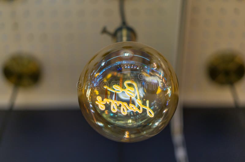 A Designer Light Bulb Hangs from the Ceiling Stock Image - Image of ...