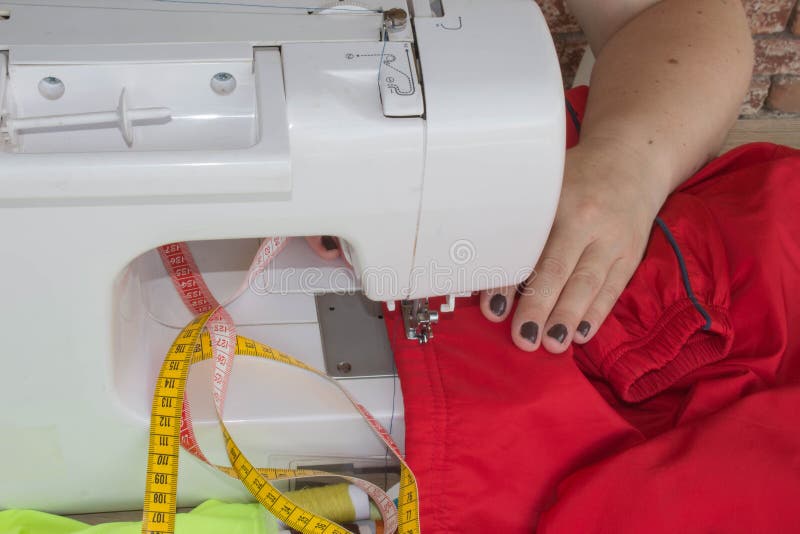 Designer Making a Garment in Her Workplace Stock Photo - Image of ...