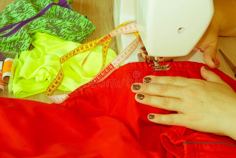 Designer Making a Garment in Her Workplace Stock Photo - Image of ...