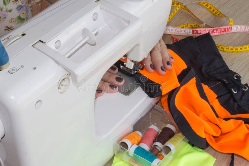 Designer Making a Garment in Her Workplace Stock Photo - Image of ...