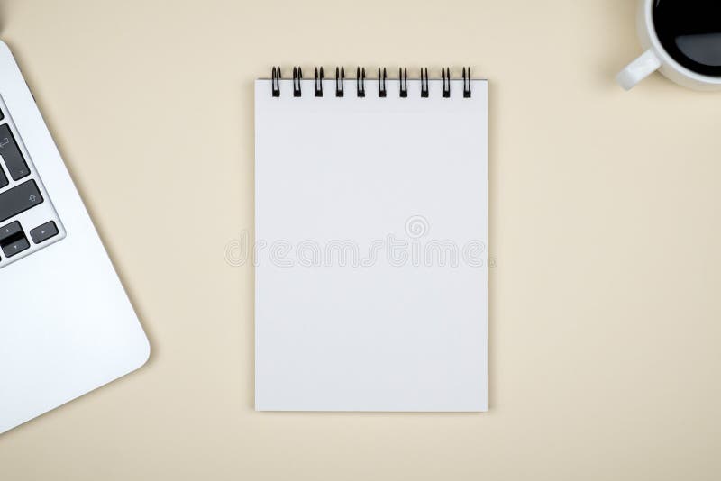 Designer Office Desk with Blank Notebook Page and Laptop Stock Image ...