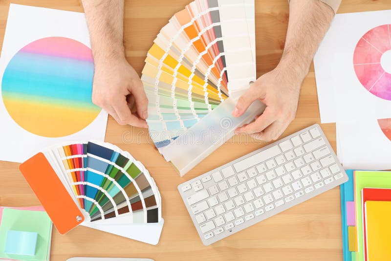 Designer with Paint Color Palette Samples at Table Stock Image - Image ...