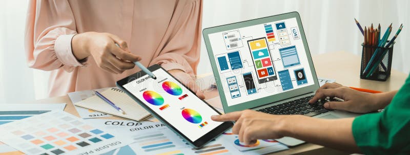 Designer Present Color while Laptop Displayed UI and UX Designs ...