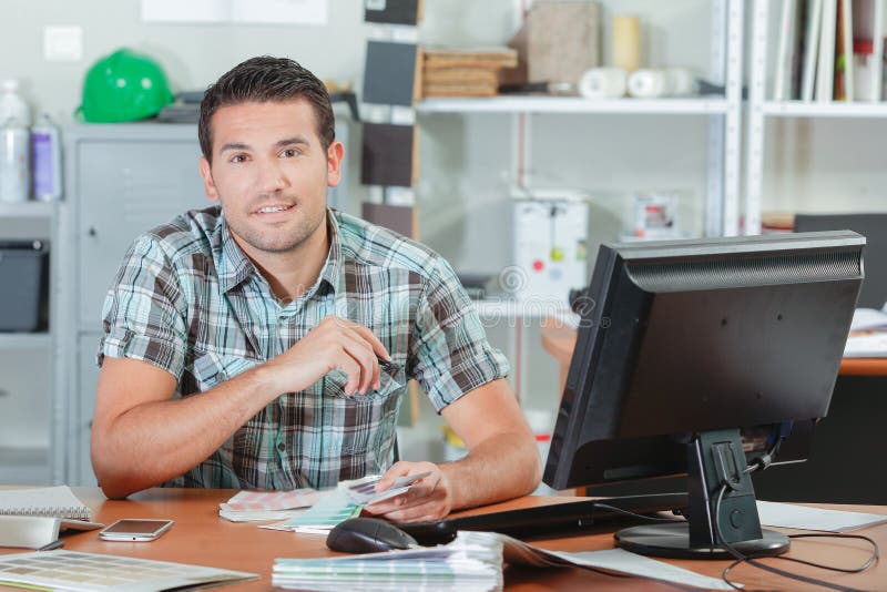 Designer sat at desk stock image. Image of selecting - 100755277