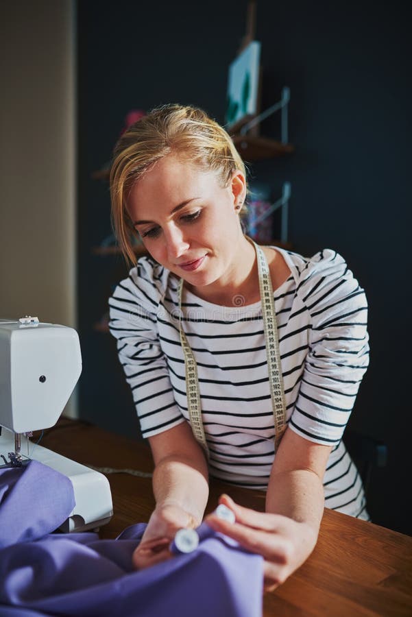 Designer sewing in office stock image. Image of contemplation - 108110329