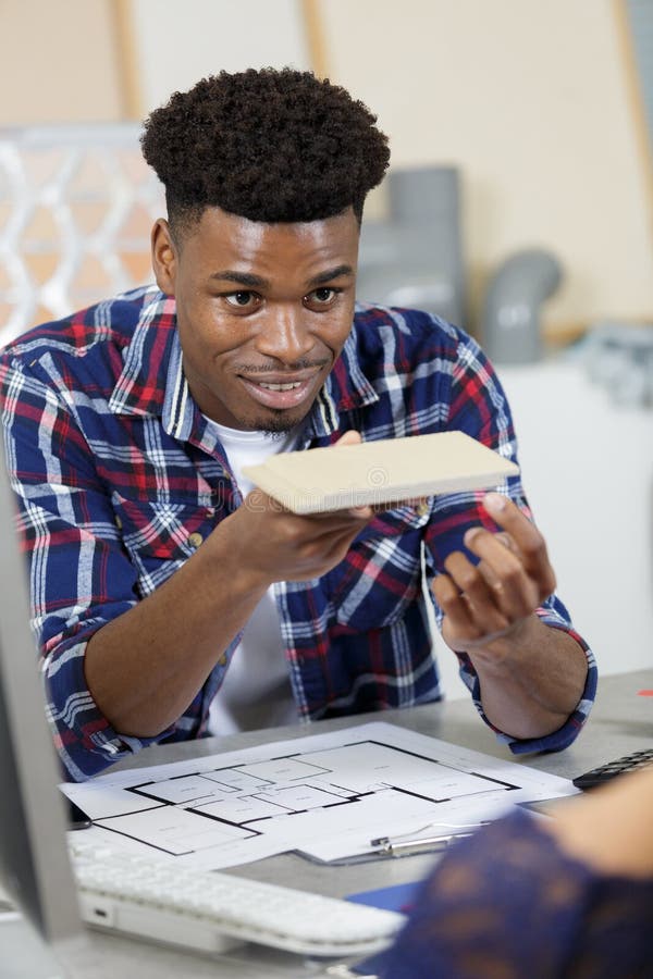 Designer Showing Sample To Client during Meeting Stock Photo - Image of ...