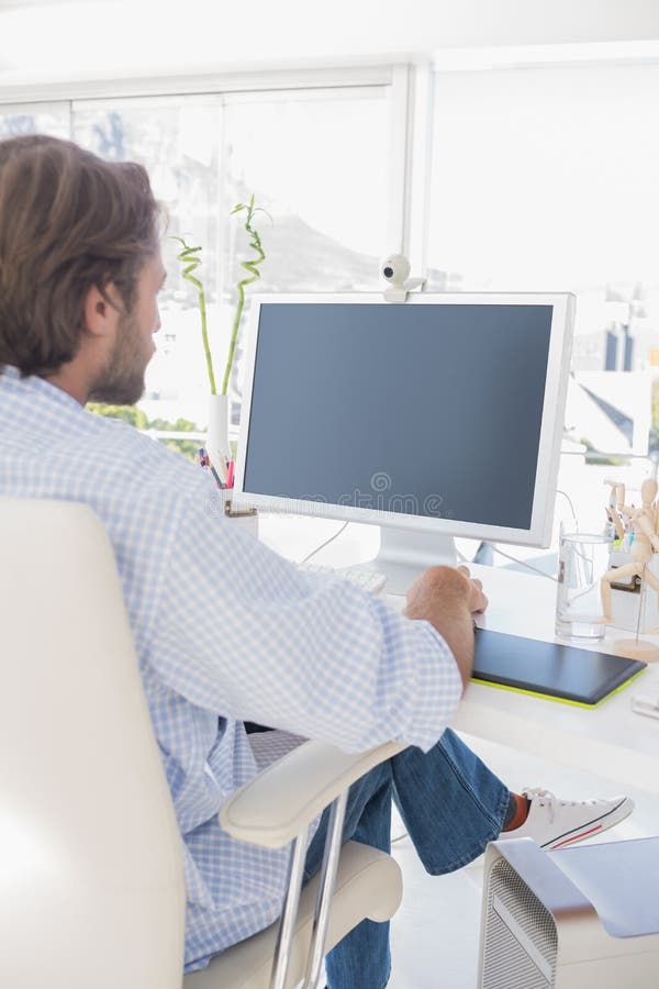 Designer Sitting at Desk and Working Stock Photo - Image of graphic ...