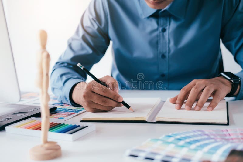 Designer sketch something. stock photo. Image of career - 124745520