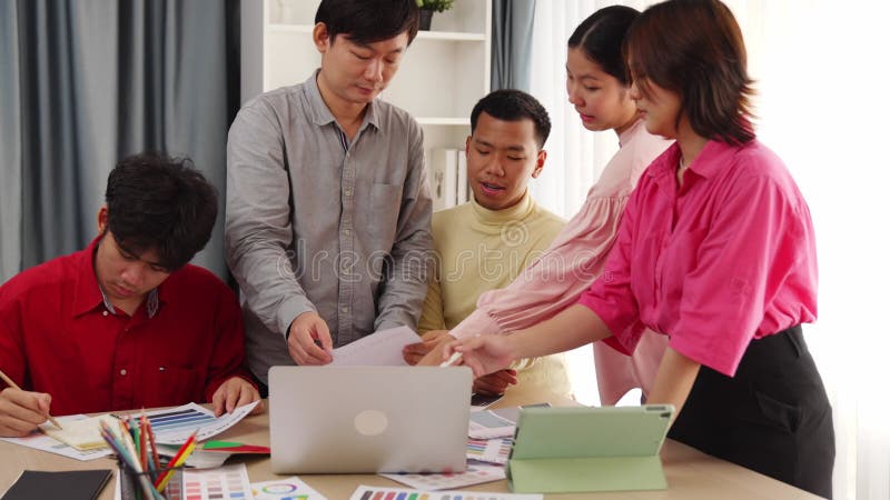 Designer Team Choosing Color for Customer in Office. Variegated Stock ...