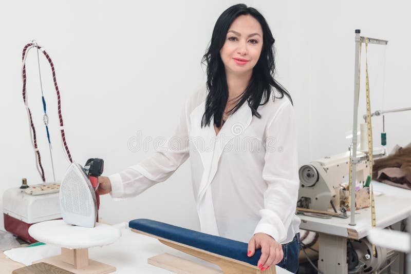 Designer using iron stock image. Image of beautiful - 123790159