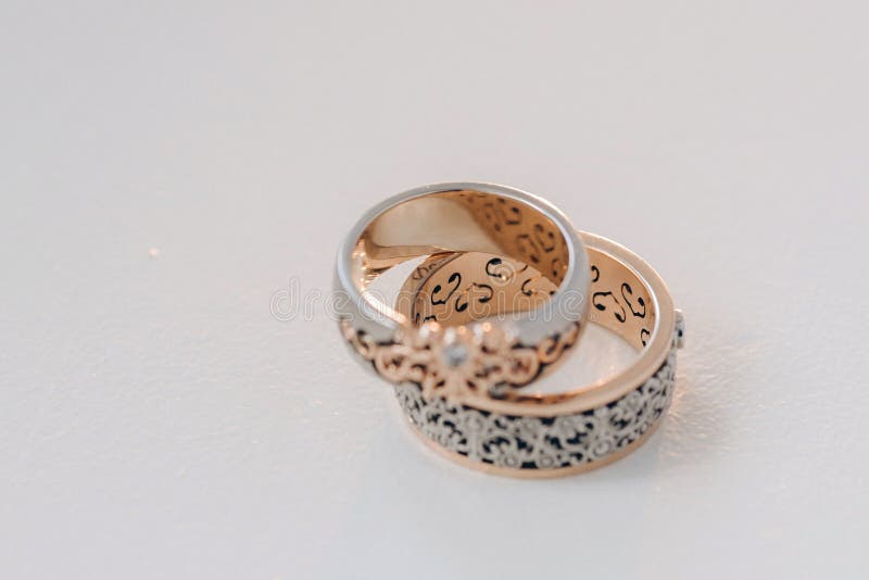 Designer Wedding Rings Lying on the Surface. Two Wedding Rings Stock ...
