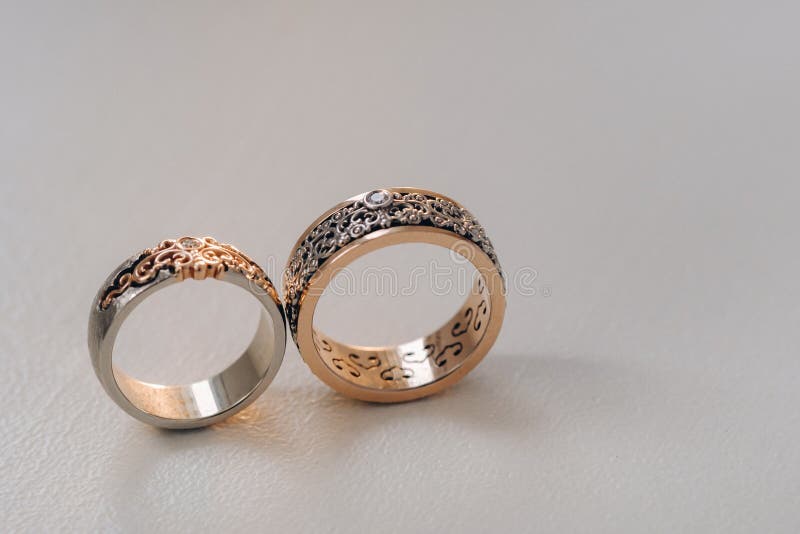 Designer Wedding Rings Lying on the Surface. Two Wedding Rings Stock ...
