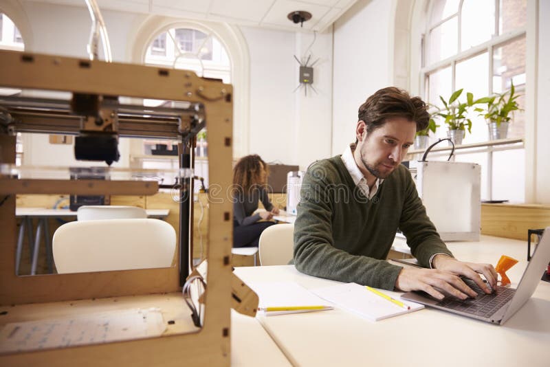Designer Working with 3D Printer and CAD Software in Studio Stock Photo ...