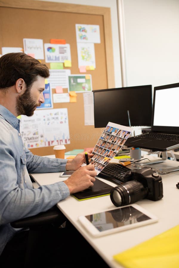 Designer Working with Digital Tablet and Laptop in Creative Office ...
