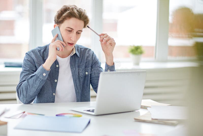Designer working on laptop stock image. Image of mobile - 113997839