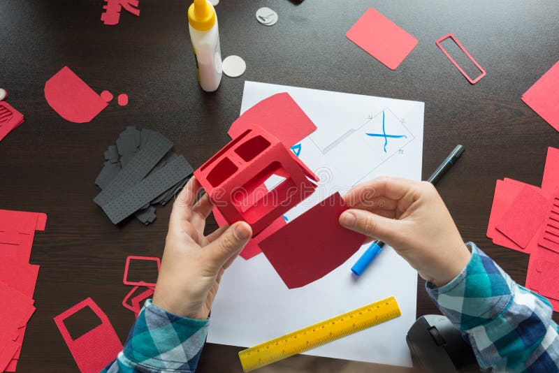 A Designer Working with Paper Modeling Template Stock Photo - Image of ...