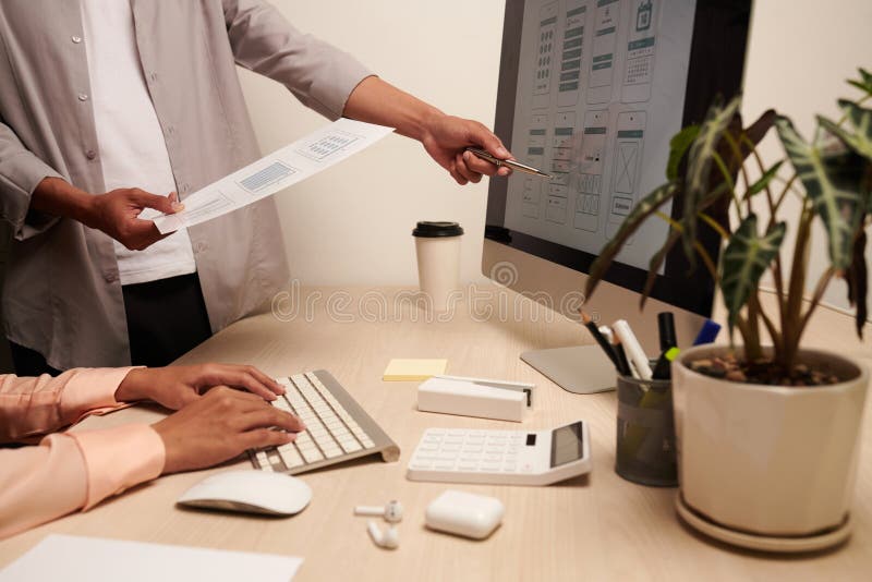 Designers Correcting Mobile Application Mockup Stock Photo - Image of ...