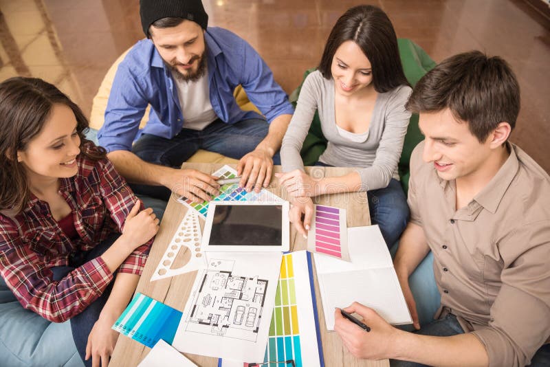 Designers Discuss the Sketches Inside the House. Stock Image - Image of ...