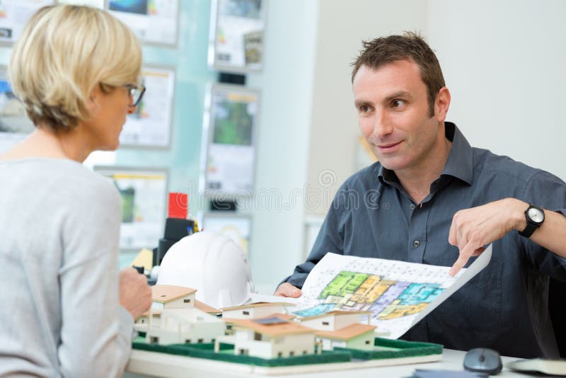 Designers Sitting at Table and Working on Project Stock Image - Image ...