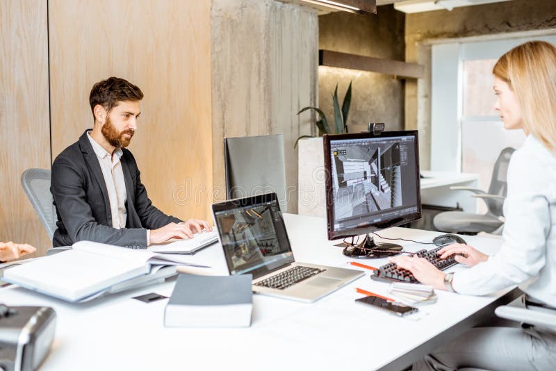 Two Interior Designers Working in the Office Stock Image - Image of ...