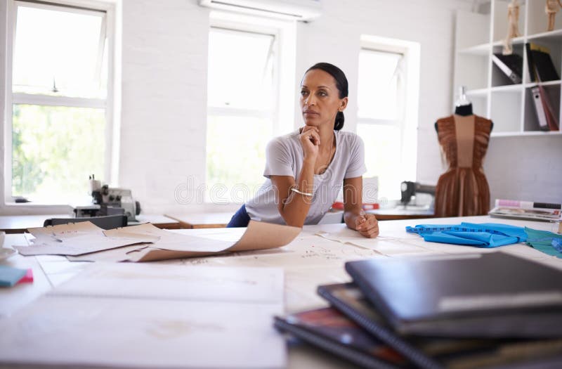 Designing Her Dreams. Young Professional Working in a Creative ...