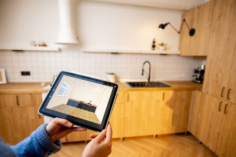 Designing Kitchen Space with a Digital Tablet Stock Photo - Image of ...