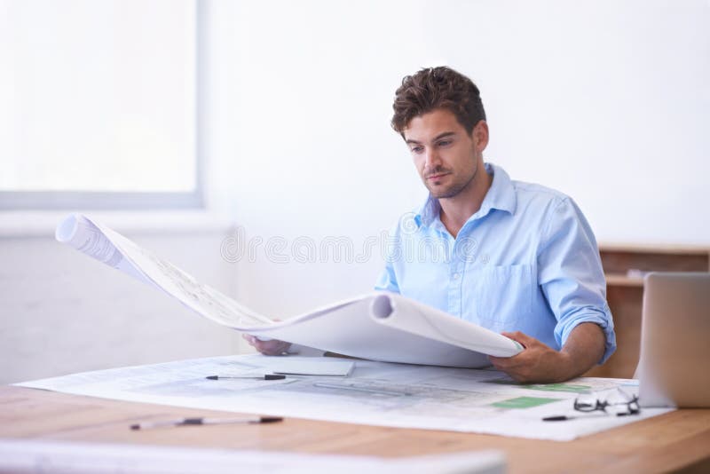 Designing the Perfect Building. an Attractive Male Architect Working in ...