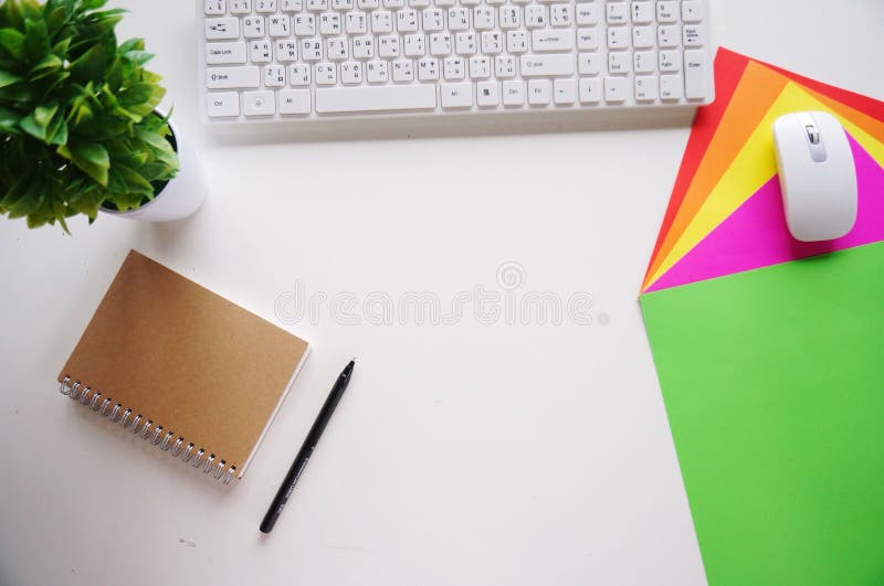 White Office Desk Table with a Lot of Things on it. Stock Image - Image ...