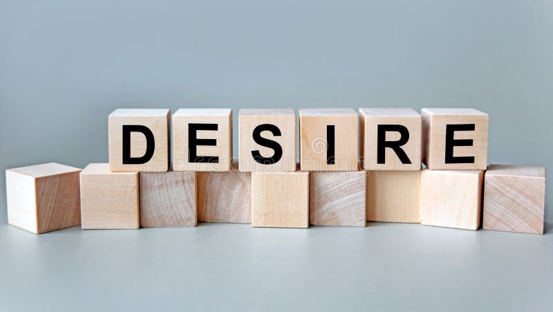 Desire, the Inscription on Wooden Cubes on a White Background Stock ...