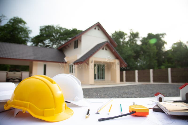 Desk of Architectural Working Project in Construction Site,with Drawing ...