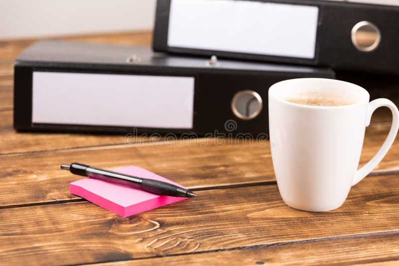 Desk with Coffee Cup, Folder, Paper and Pen Stock Photo - Image of ...
