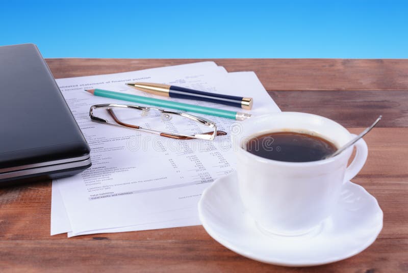 Desk with Computer, Glasses, Pens and Business Papers Stock Photo ...