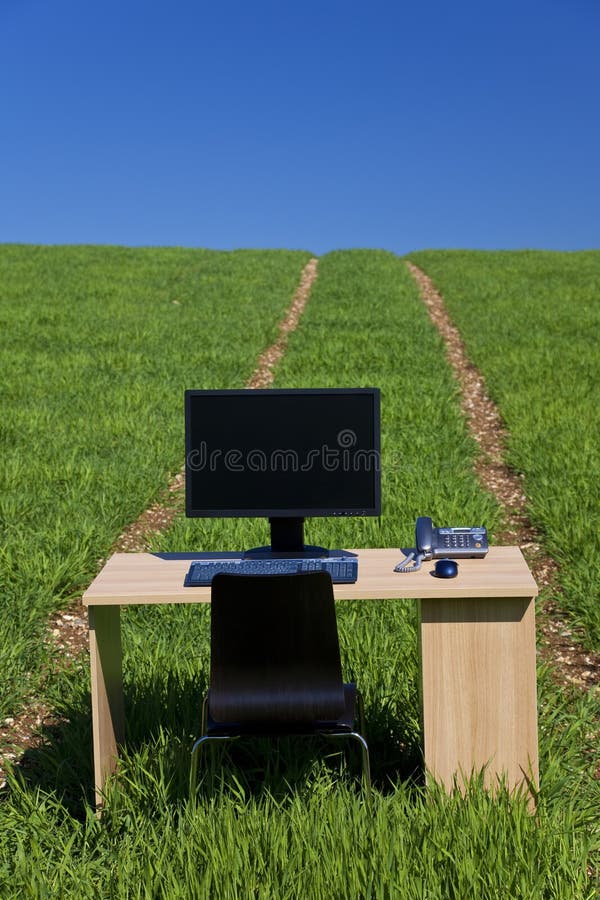 Desk and Computer in Green Field with Path Stock Image - Image of ...
