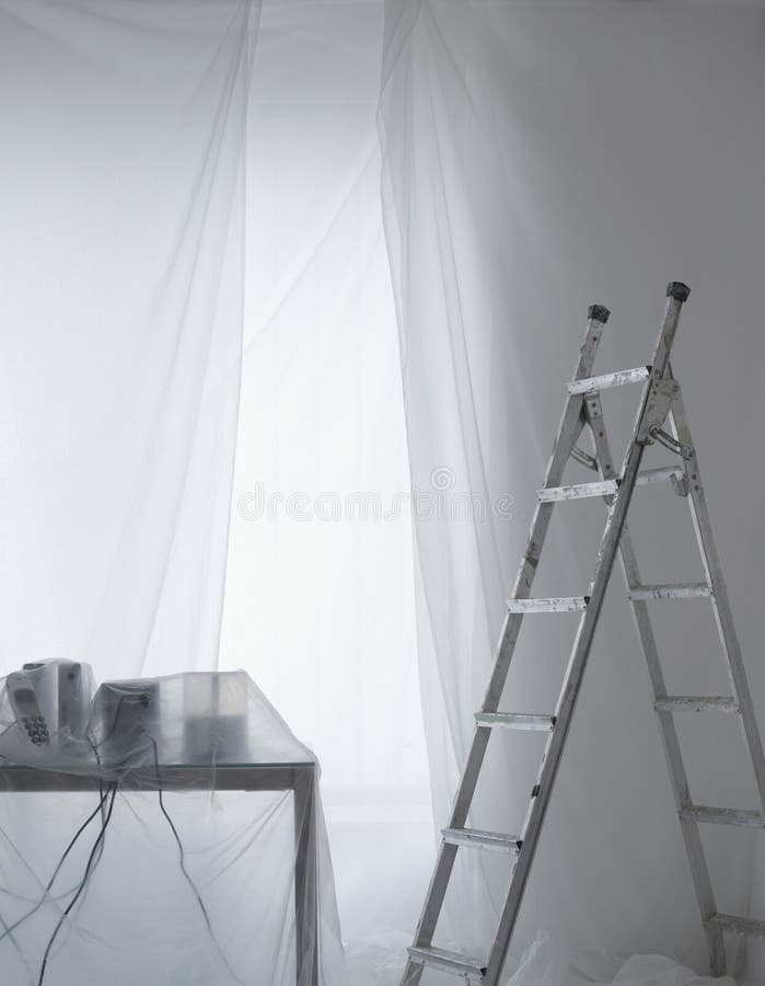 Desk and Computer Covered in Transparent Dust Sheets Stock Image ...