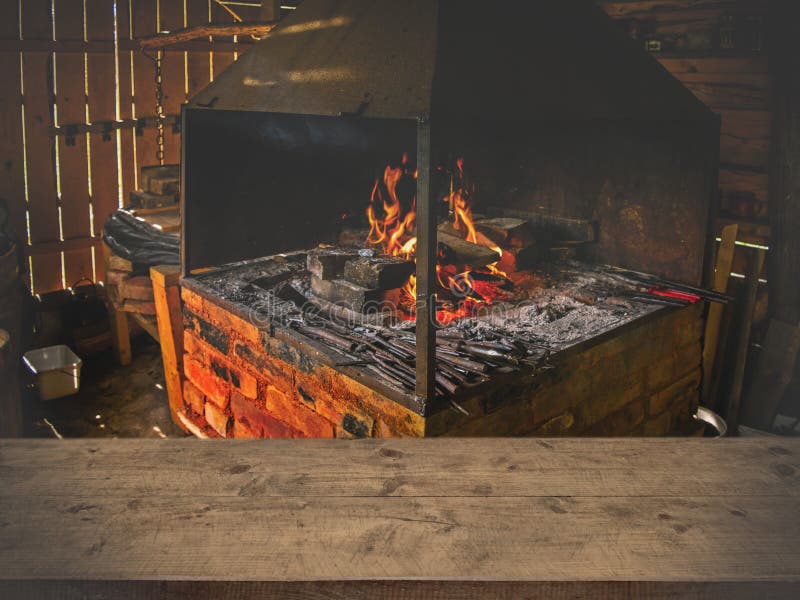 Desk of Free Space and Workshop. Interior of an Old Forge. Bright Fire ...