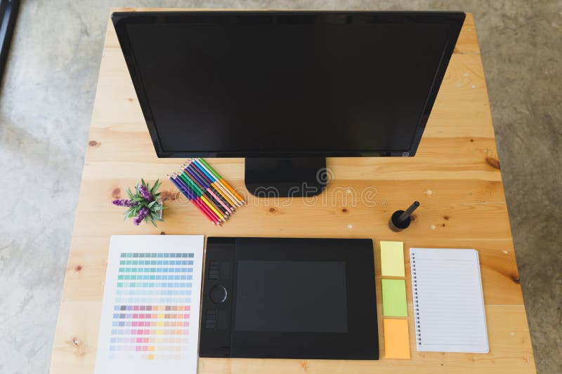 Desk of Graphic Designer at Work - Digital Tablet, Computer Screen ...