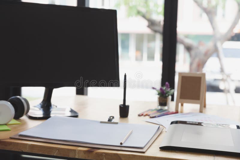 Desk of Graphic Designer at Work - Digital Tablet, Computer Screen ...