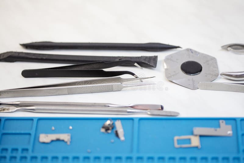 Desk of Mobile Phone Parts in Service Stock Image - Image of scratch ...