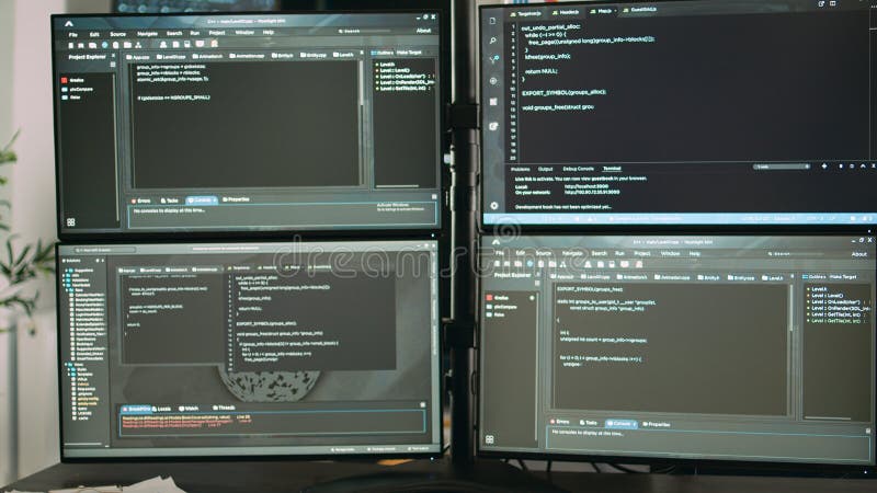 Desk with Multiple Monitors Displaying Terminal Window and Artificial ... Desk with Multiple Monitors Displaying Terminal Window and Artificial ...