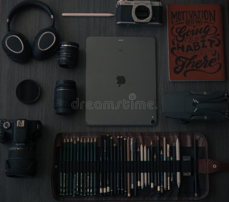 Desk with Multiple Objects on it Editorial Photo - Image of surface ...