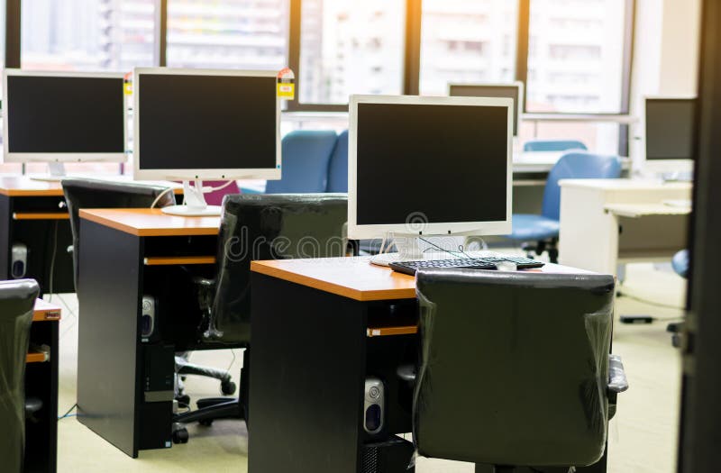 Desk in Office Computer in High Building Stock Photo - Image of desk ...