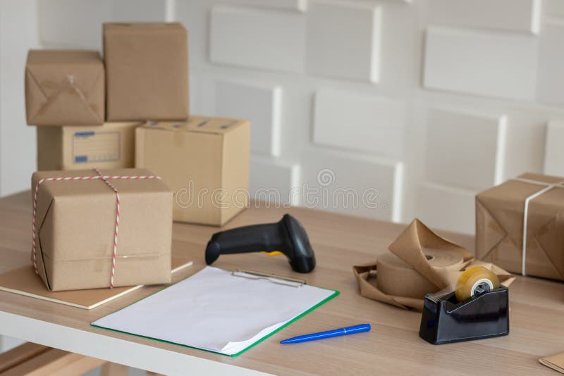 On the Desk in the Office There are Many Parcels Waiting To Be Packaged ...
