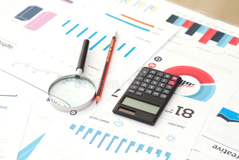 A Desk of Papers and a Calculator Stock Image - Image of pencil ...