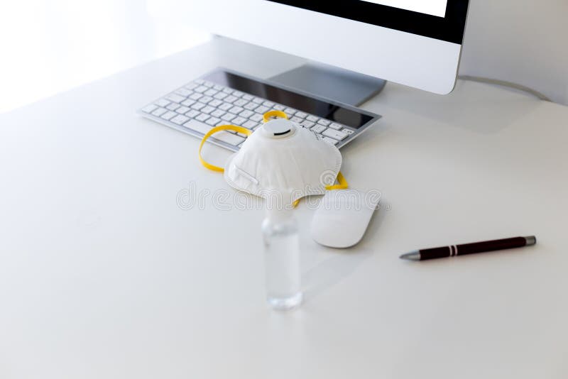 Desk with Screen Computer, Mouse, Keyboard, Pen and Face Mask Stock ...