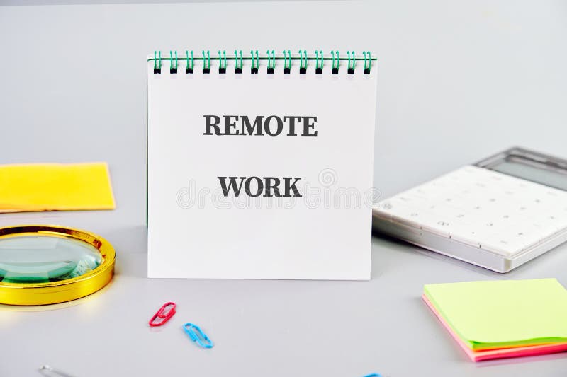 Desk Setup Featuring a Notebook Labeled Remote Work, with Stationery ...