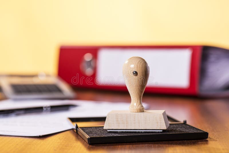 Desk with Stamp and Office Material Stock Image - Image of competent ...