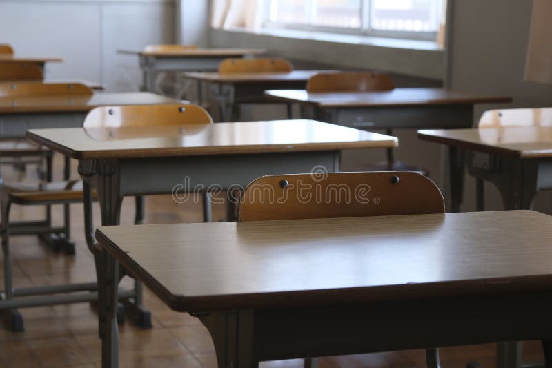 Desks in a classroom stock photo. Image of classroom - 314852502