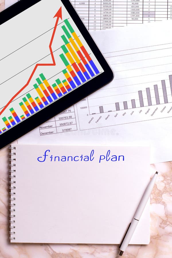 Desktop with Business Charts. 52-week Savings Plan. Financial Planner ...