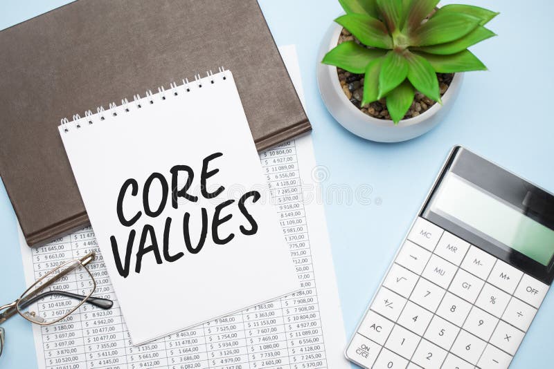 On the Desktop are a Calculator, Diaries, a Potted Plant, a Pen and a ...