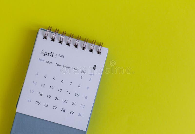 Desktop Calendar for April 2022 for Planning on the Table. Stock Photo ...